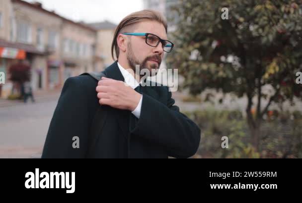 Man carrying suit on shoulder Stock Videos & Footage - HD and 4K Video ...