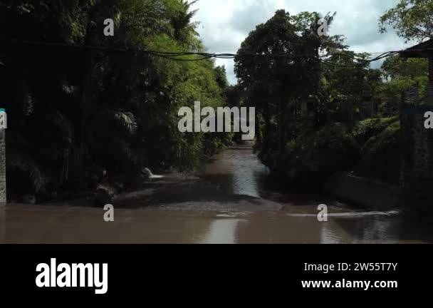 Video from drone of an old water dam for water supply of rice fields in ...