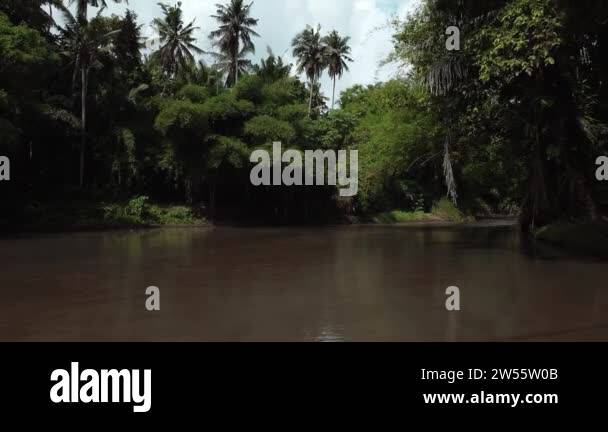 Video from drone of an old water dam for water supply of rice fields in ...