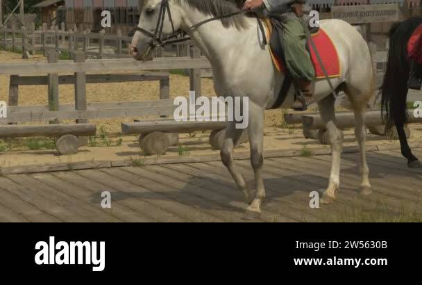 Three Actors in Ancient Costumes Are Riding, Horses Closeup, Wooden ...