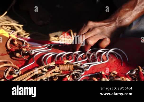 Close up piercing the body of devotee with hook Stock Video Footage - Alamy
