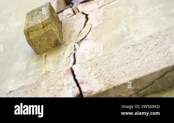 Damaged Collapsed wall of an old house. Cleft crack close-up ...
