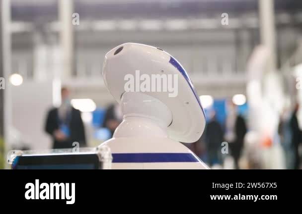 Futuristic robot on background of people. Media. Head of futuristic ...