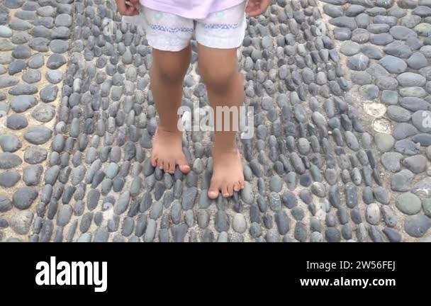 Pebble step Stock Videos & Footage - HD and 4K Video Clips - Alamy