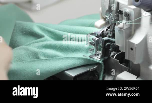 Overlock Sewing Machine. Female hands working on Tailoring. Automated ...