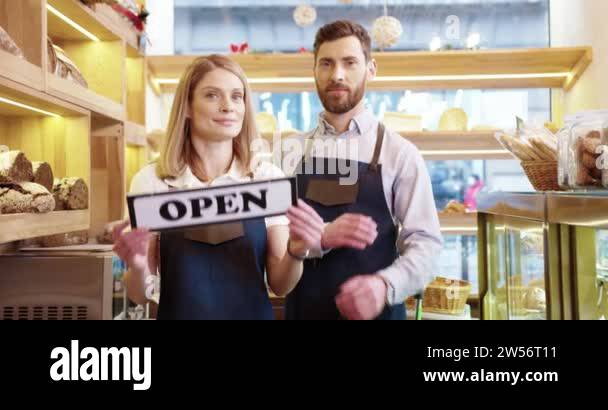 Happy family holding sign Stock Videos & Footage - HD and 4K Video ...