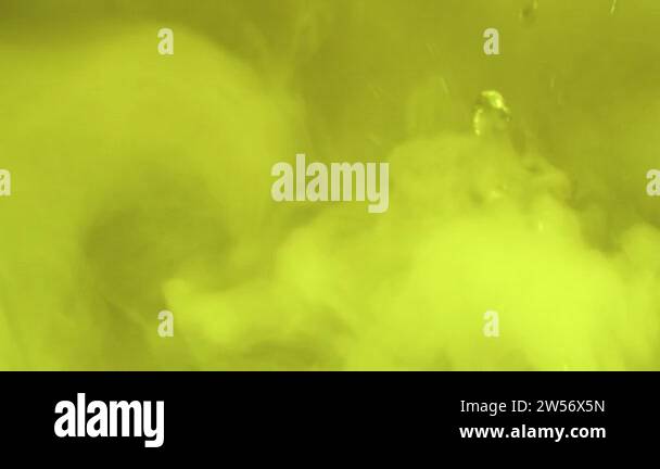 Chemical reaction with boiling swirling water splashes, jumping drops ...