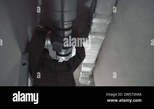 An employee who does the installation of ventilation systems in a new ...