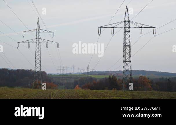 Large transmission towers in the countryside. Different types of ...