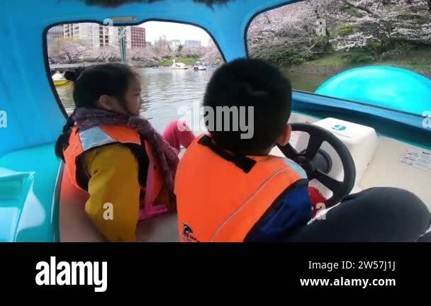 Kid girl driving boat Stock Videos & Footage - HD and 4K Video Clips ...