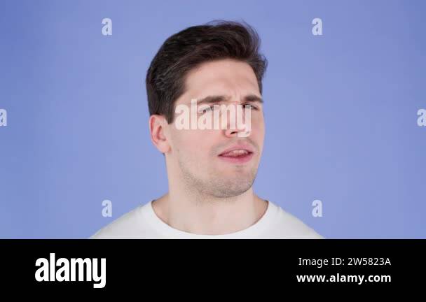 Inflexible man disapproving with no head sign, nods head disapprovingly ...