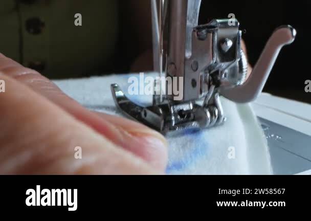super close-up, details. sewing process on a sewing machine, zigzag ...
