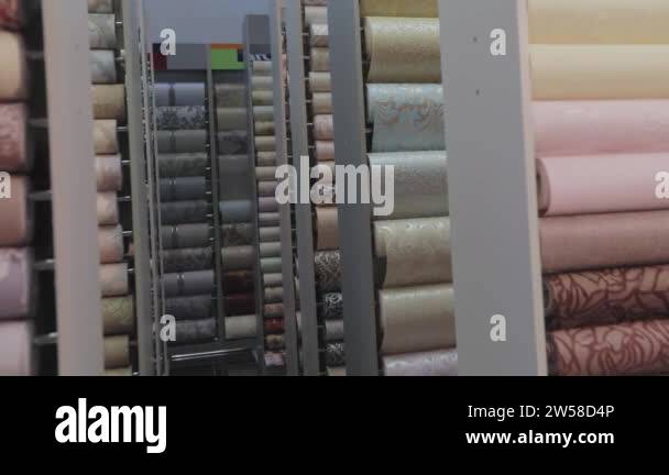 Stands with new samples. Rolls with wallpaper. Stands with rolls of ...