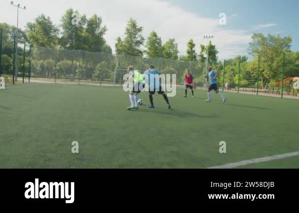 Footballers expressing disagreement, arguing with arbiter on pitch ...