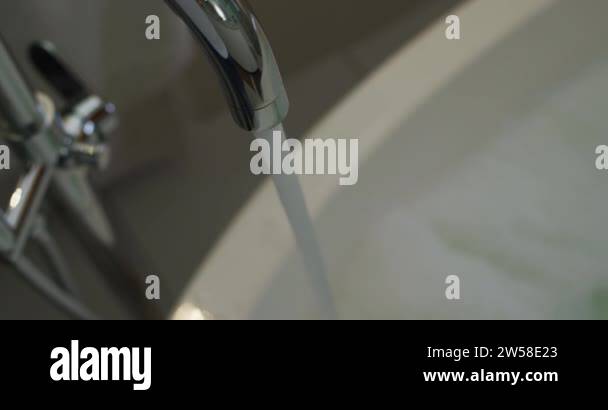 Running a bath home Stock Videos & Footage - HD and 4K Video Clips - Alamy