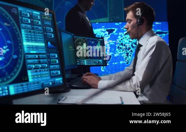 Workplace of the air traffic controllers in the control tower. Team of ...