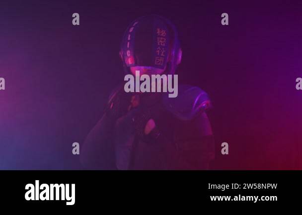 Cyberpunk future concept. Police officer stands in boxing pose with ...