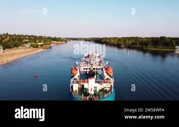Cargo ship standing at beach. Footage. Top view of beautiful old cargo ...