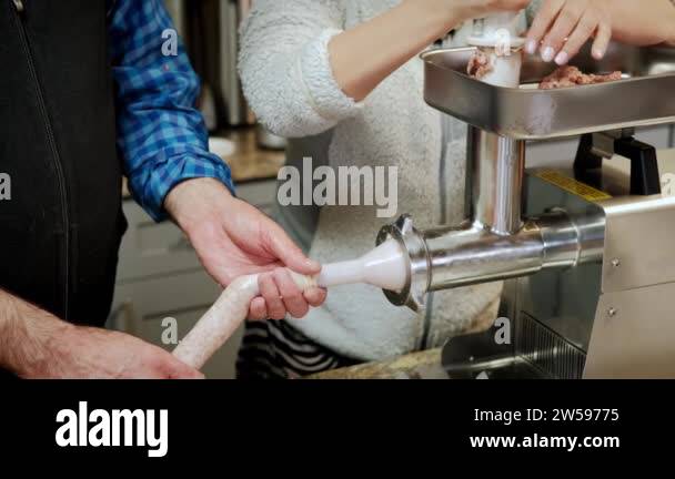 Close up of Sausage making process factory manual machine meat Stock ...