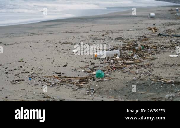Plastic bottles and containers waste on ocean sea coast,polluted beach ...