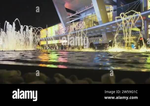 Mall of Qatar in Doha Qatar at night zooming in and panning shot ...
