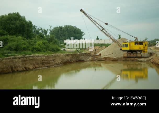Mining gravel sand pit excavator digger dredger extraction machine ...
