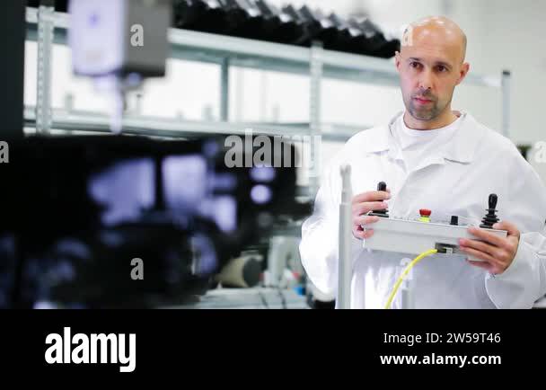 Professional quality engineer measuring on the 3D measurement machine ...