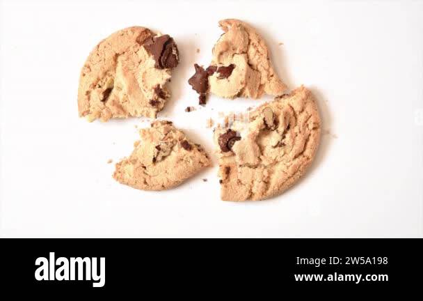 Stop motion animation of a cookie breaking into pieces and vanishing ...