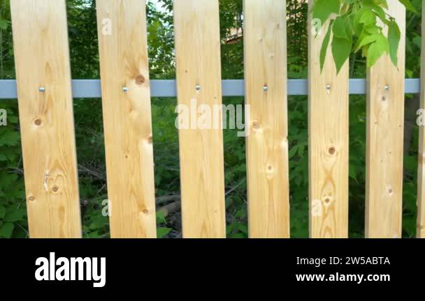 Front garden timber boundary fence Stock Videos & Footage - HD and 4K ...