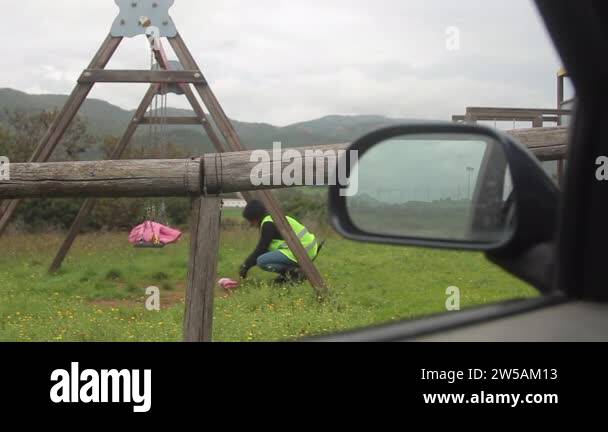 police car and female police officer at the scene of kidnapping of ...