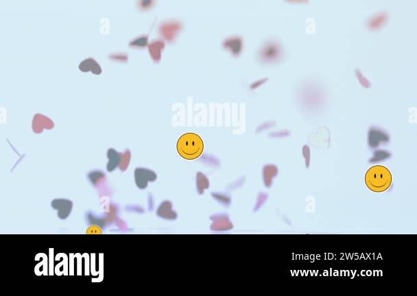 Multiple smiling face emojis floating over multiple hearts falling ...