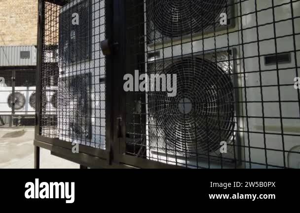 Roof-mounted air conditioning system. A series of rotating fans to cool ...