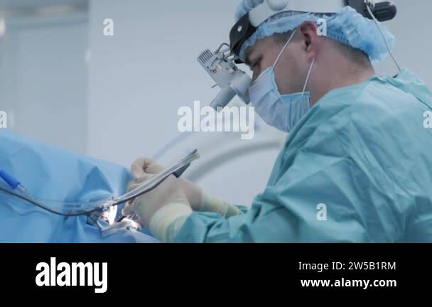 Operation of removing tonsils, tonsillectomy. In modern clinic under ...