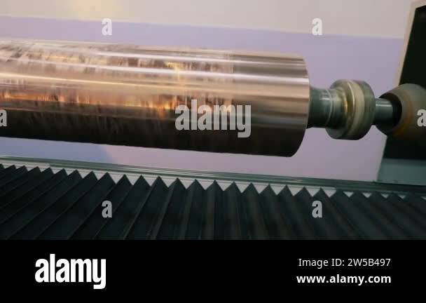 Printed shaft. Cylindrical press for wallpaper printing. The mechanism ...