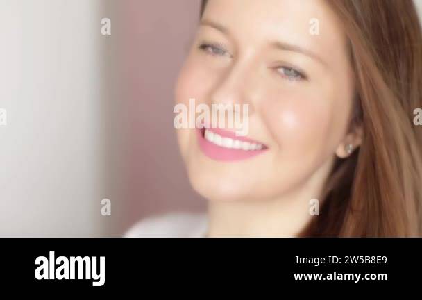 Beautiful woman with glowing healthy skin, natural makeup and long ...