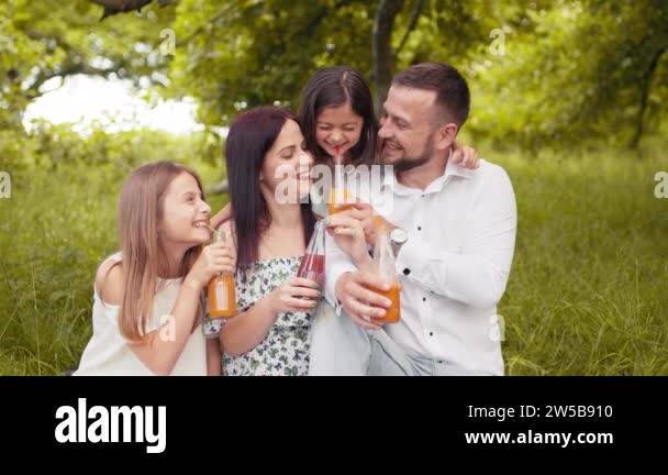 Young parents two daughters sitting Stock Videos & Footage - HD and 4K ...