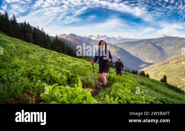 Cinemagraph Continuous Loop Animation. Adventurous people Hiking in the ...
