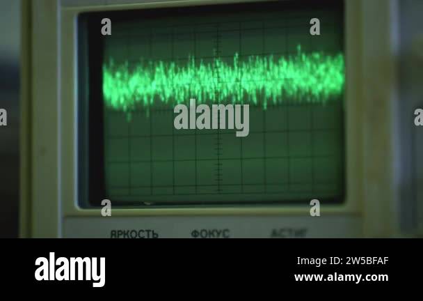 Oscilloscope wave on analog screen. Military tracking monitor ...