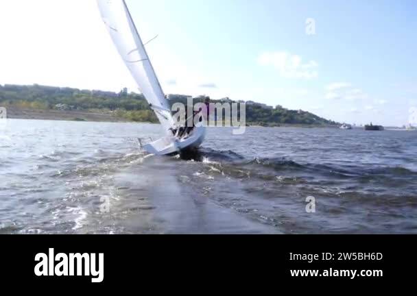 Dangerous maneuver on a sailing yacht, the boat tilted during the turn ...