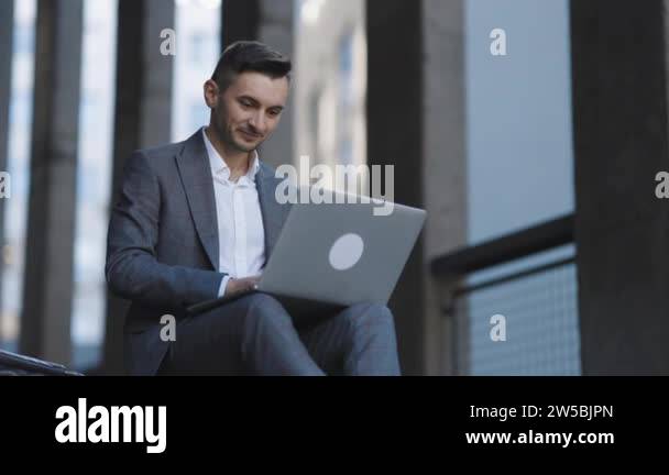 Working remotely and Self isolation. Bearded man working with laptop ...