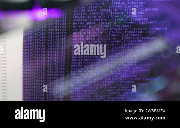 Violet Computer Software Code Moving On A Black Monitor Reflect On Glass Abstract Computer