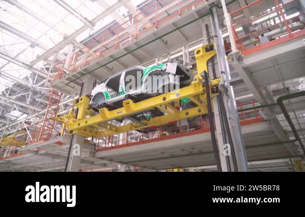 Body of car on conveyor. Modern Assembly of cars at the plant. The ...