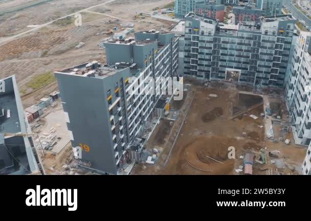 Aerial view of construction site, building work process modern an ...