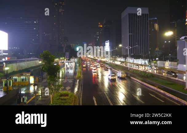 Night illumination in Jakarta city. Night traffic on street. Indonesia. Panorama, 4k Stock Video ...