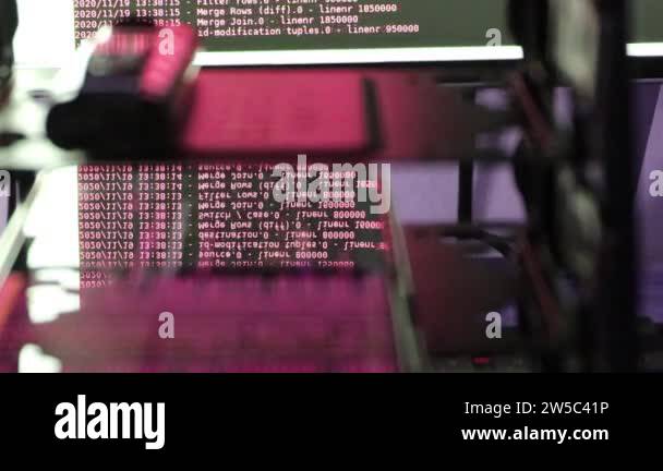 Red Computer Software Code Moving On A Black Monitor Reflect On Glass Abstract Computer Hacking