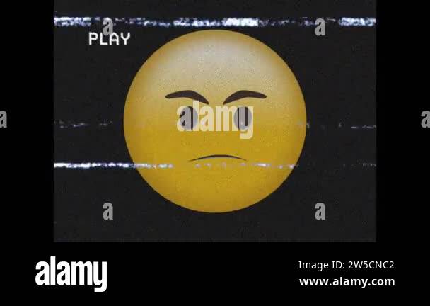 Digital animation of vhs glitch effect over angry face emoji against ...