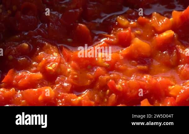 Tomato sauce. Pan Right. Close up. Boiling tomato sauce made from ...