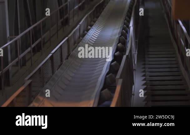 Moving conveyor belt line at the factory. Stock footage. Conveyor belt ...