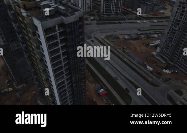 Construction site for a new city block. The completed houses are ...