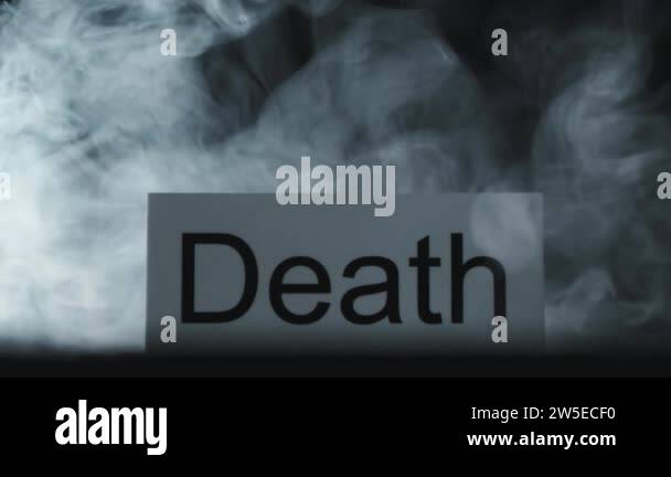Close up isolated on black background shot of wisps of smoke flowing ...